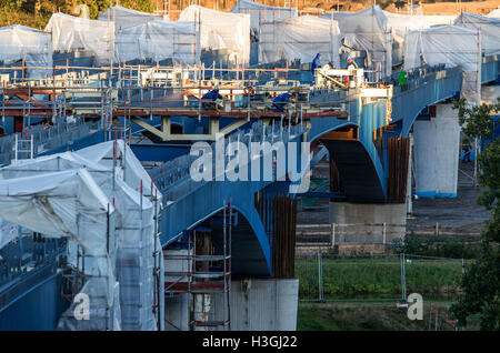 Grabow, Germany. 04th Oct, 2016. Fitters working on the new bridge for ...