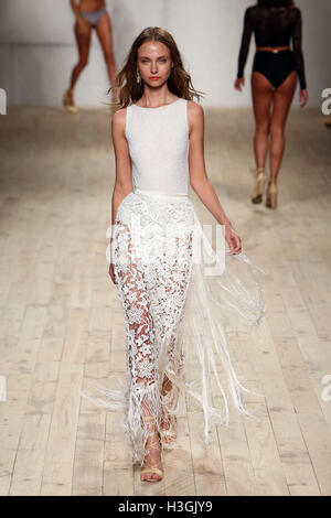 Lisbon, Portugal. 8th Oct, 2016. A model presents a creation from the ...