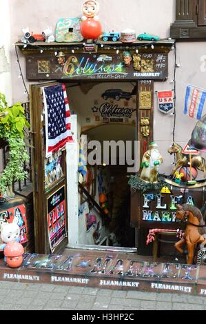 Street café with many things and toys Stock Photo - Alamy