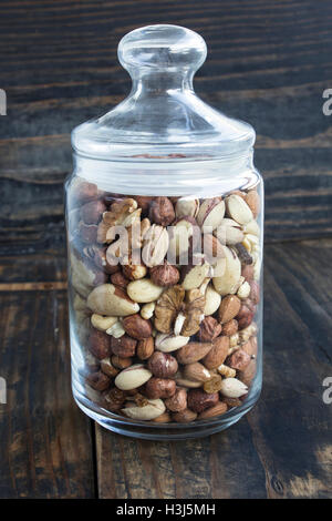 Cashew and almonds nuts in a jar. Set of nuts isolated on white ...