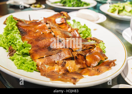 Cantonese cuisine Roast Suckling Pig Stock Photo - Alamy