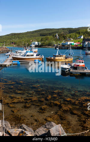 The pretty harbour at Tovik, Norway. A small fishing boat harbour close ...