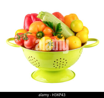 Colander with fresh basil and tomatoes on wooden background, top view ...
