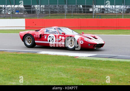 Charlie Birkett driving a Red, 1966 Ford GT40 during the qualifying ...