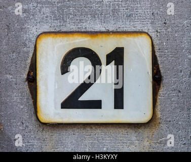 House Number 21 on White Wall: Address Marker for Home Stock Photo - Alamy
