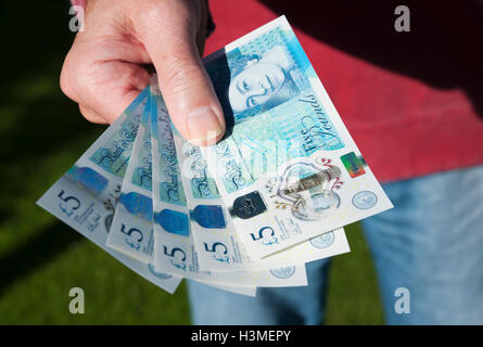 UK money banknotes fan of UK polymer £50 notes fifty pound banknotes ...