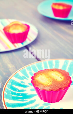 Fresh homemade cake and muffin on Sackcloth woven texture background ...