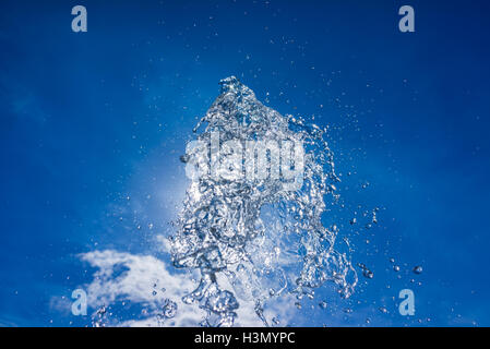 Stream of water divided into many droplets Stock Photo - Alamy
