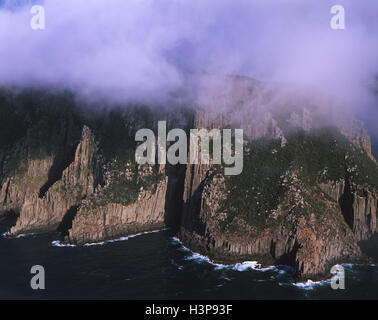 Cape Pillar with cliffs up to 300 m high, of columnar dolerite under a ...