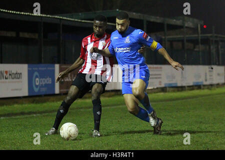 Nnamdi Nwachuku of Hornchurch tussles with Liam Thomas of Redbridge ...