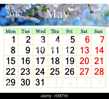 calendar for May 2016 with white blooming apple tree Stock Photo - Alamy