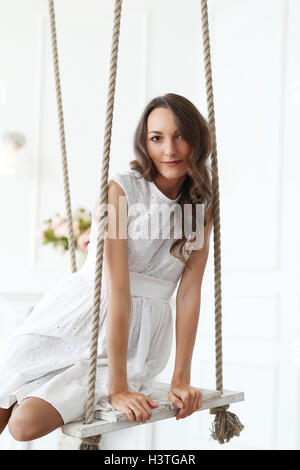 Beautiful woman in white dress on golden yellow wheat field Stock Photo ...