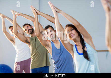 group of smiling people exercising in the gym Stock Photo - Alamy