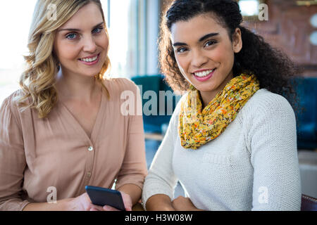 Portrait of two friends smiling Stock Photo - Alamy