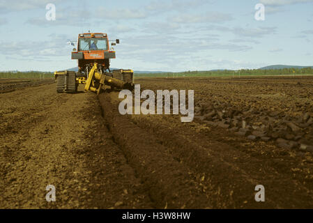 PEAT BOG where the tractor turns up peat for energy and heat Stock ...