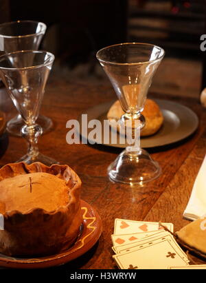 Elizabethan dining table set with typical foods, at Blakesley Hall is a ...