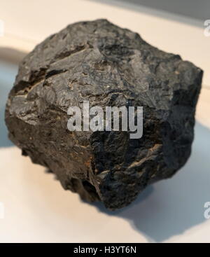 A sample of Basalt, a dark-coloured, fine-grained, igneous rock ...