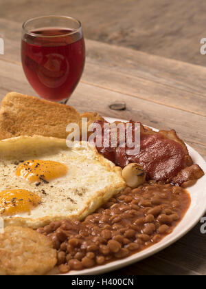 Bullseye egg served in a plate on a white background Stock Photo - Alamy