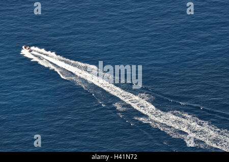 A speed boat sailing on the ocean Stock Photo - Alamy