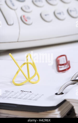 Bent paper clip Stock Photo - Alamy
