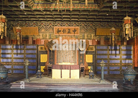 Imperial throne room in Forbidden City, Beijing. The throne is flanked ...