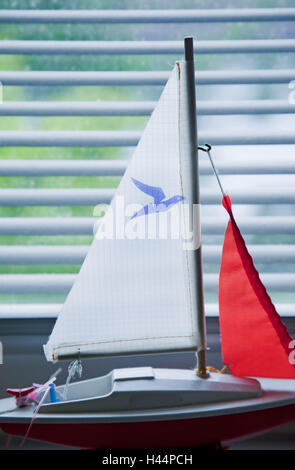 Ship model on the window sill, symbol for travelling, sailing ...