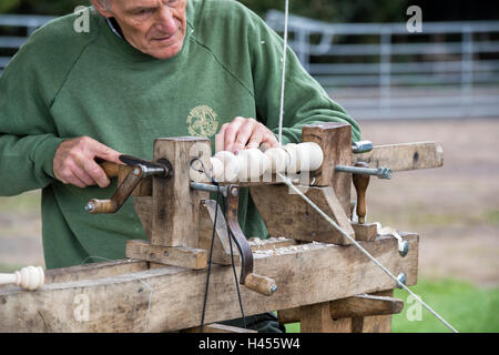 A demonstration of a traditional woodworking pole lathe at a country ...