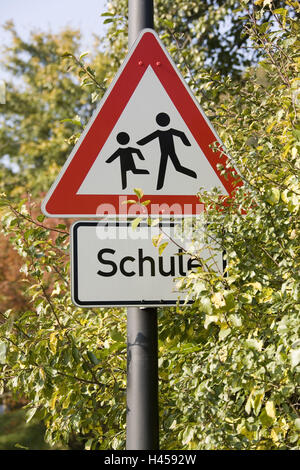 The traffic sign at the hedge Stock Photo - Alamy