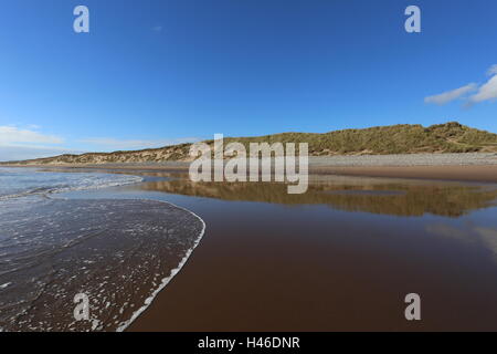 Dunes reflected in wet sand Montrose Bay Angus Scotland October 2016 ...