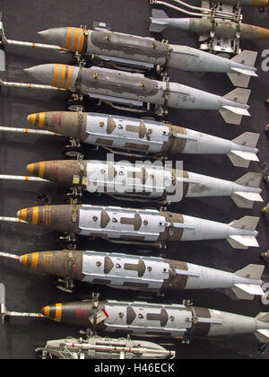US Navy Bunker Buster bombs are staged in the hangar bay aboard USS ...