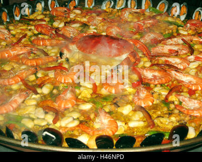 Close up frying pan with big meal with sausage. Selective focus Stock ...