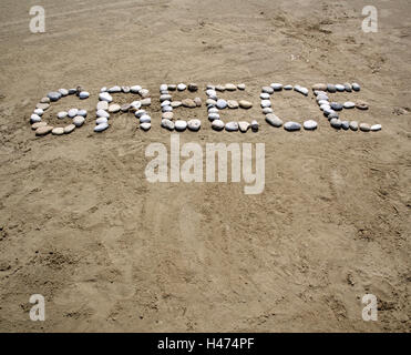 Greece written in pebbles at Agnos Beach, Corfu Greece, next to Greek ...