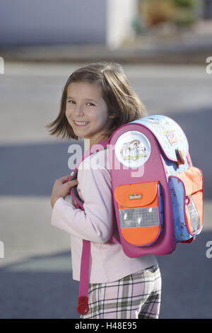 Schoolgirl with a schoolbag (model release Stock Photo - Alamy