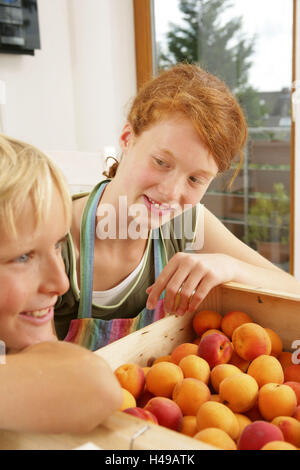 Children, cuisine, happily, smile, apricots Stock Photo - Alamy