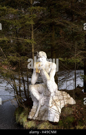 Figure of Faunus, horned Roman god of the forest, with a child, leaning ...