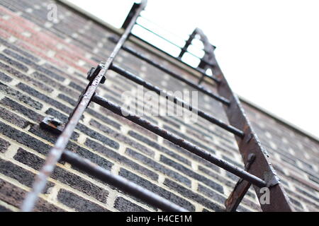 Rusty steel wall ladder Stock Photo - Alamy