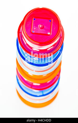 Stack of shakers, colourful Stock Photo - Alamy