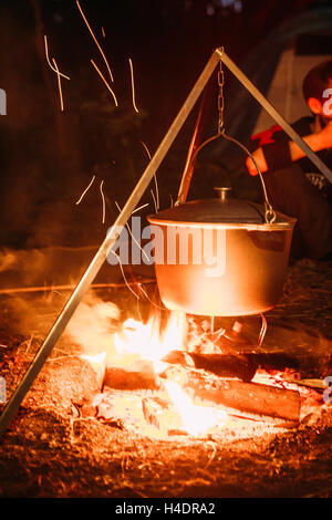 Boiling water pot over an open fire, Kamchatka, Russia Stock Photo - Alamy