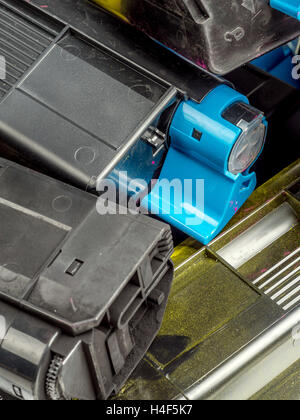 Pile of used color laser printer toner cartridges Stock Photo - Alamy