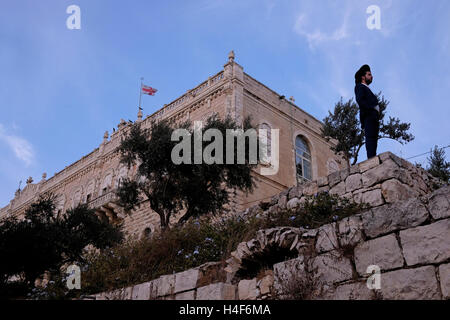 An Ultra orthodox Jew gazing from the Greek orthodox seminary in Mount ...