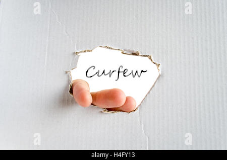 Curfew text concept isolated over white background Stock Photo - Alamy