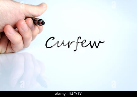 Curfew text concept isolated over white background Stock Photo - Alamy