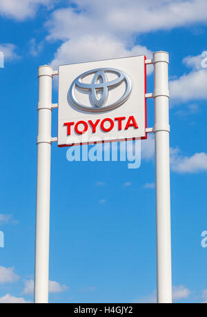 Toyota automobile dealership sign against the blue sky background Stock ...