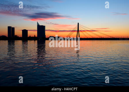 Riga suspension bridge's silhouette at sunset Stock Photo - Alamy
