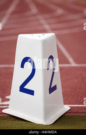 Number two signpost in an athletic running track. Vertical Stock Photo ...