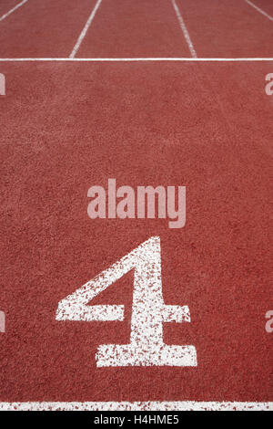 Number four signpost in an athletic running track. Vertical Stock Photo ...