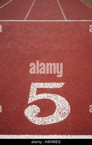 Numbers signpost in an athletic running track. Vertical Stock Photo - Alamy