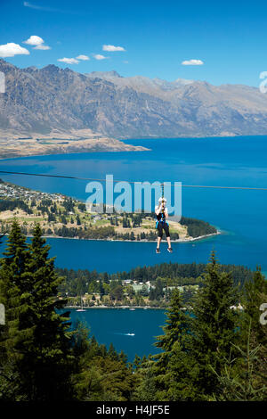 Ziplining at Skyline, above Lake Wakatipu and Queenstown, Otago Stock ...