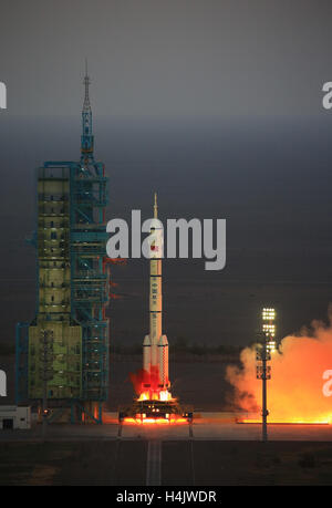 The Long March 2F rocket carrying the Shenzhou-8 unmanned spacecraft is ...