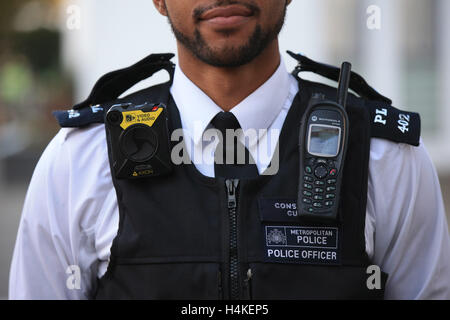 A policeman wears the new Body Worn Video (BWV) camera outside Lewisham ...